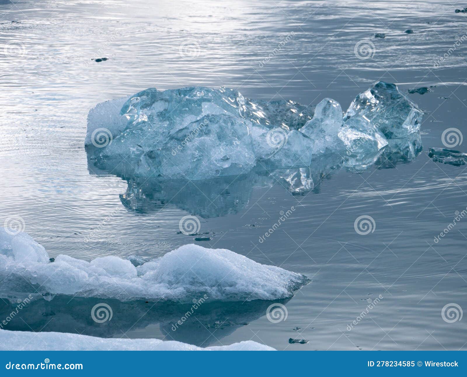 Melting Blue Ice Floating on Top of the Water Stock Image - Image of ...