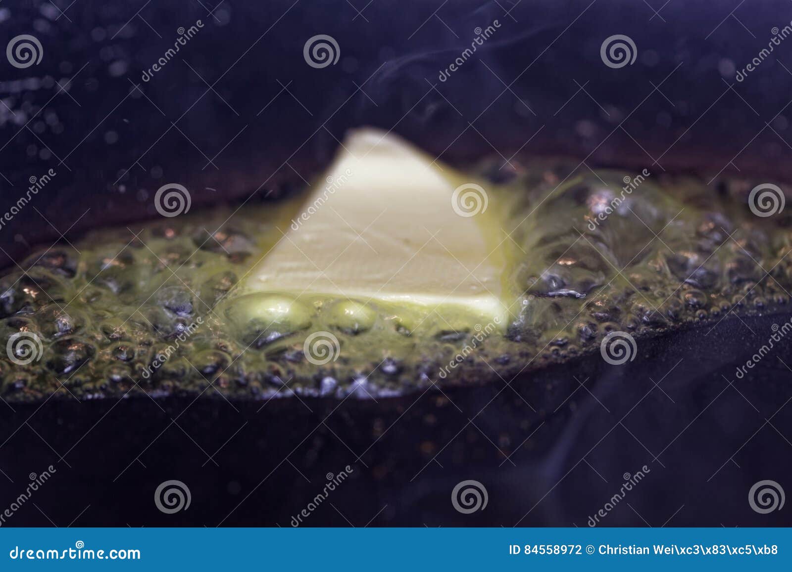 Melting butter in a pan stock photo. Image of melt, piece - 84558972