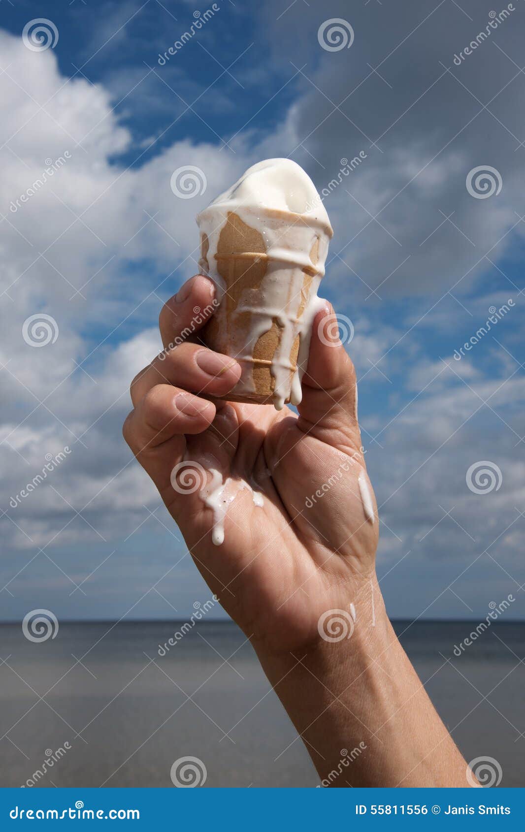 Melting ice cream. stock photo. Image of hand, vanilla - 55811556