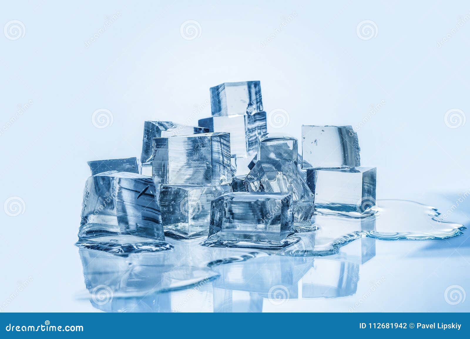 Melting Ice Cubes on Blue Background Stock Photo - Image of winter ...