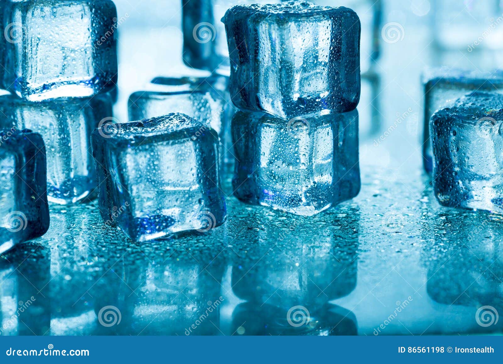 Melting Ice Cubes on Glass Table Stock Photo - Image of melting, bubble ...