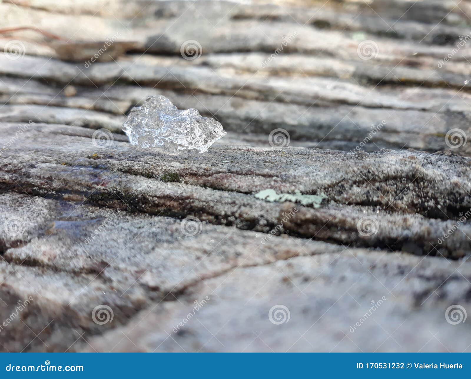 Melting ice on rock stock photo. Image of snow, rock - 170531232