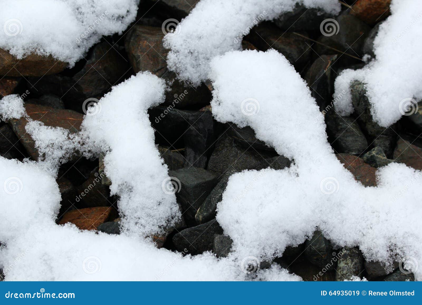 Melting Snow on Rocks stock image. Image of melting, layer - 64935019
