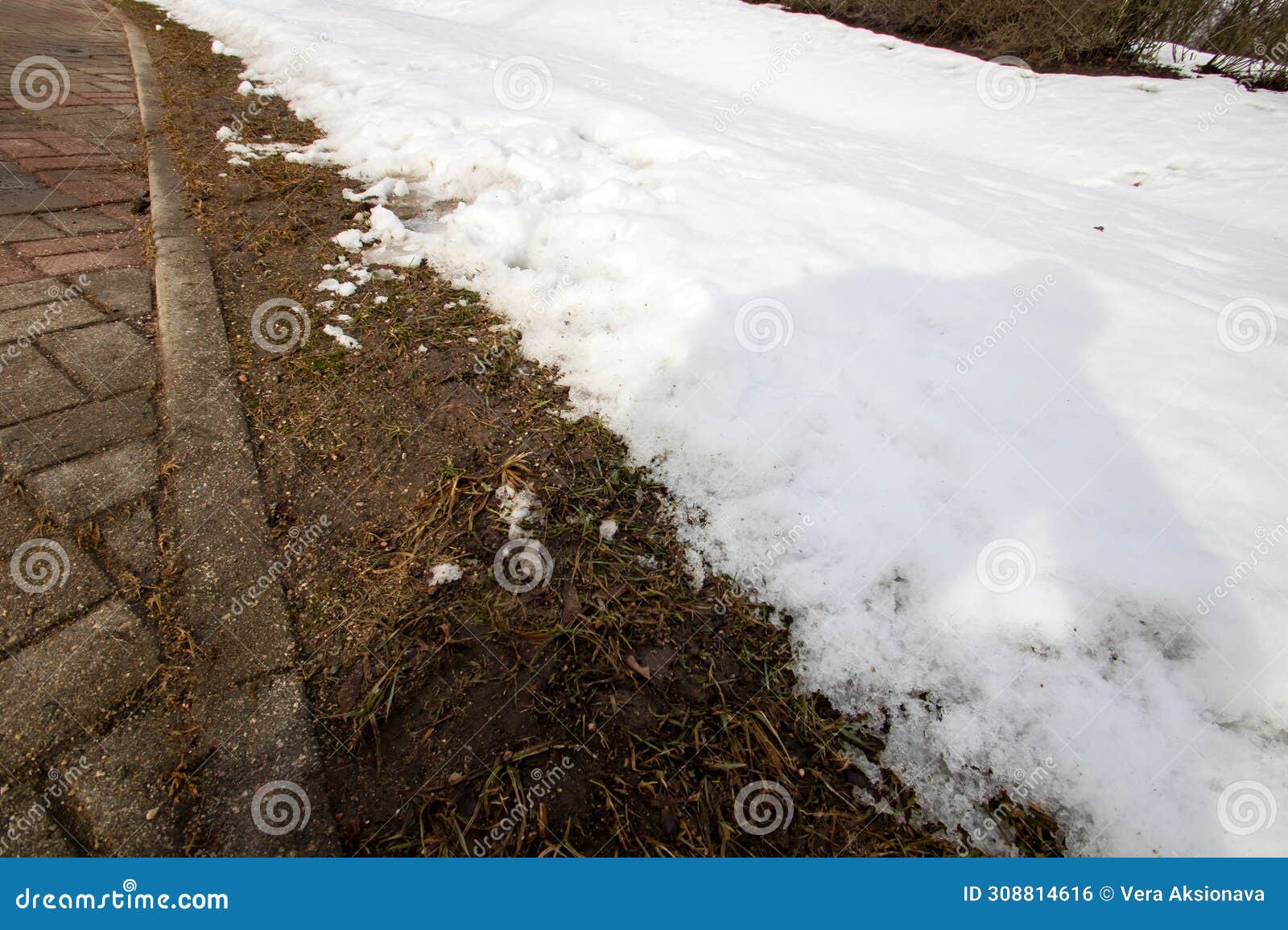 Melting Snow on Side of Road by Curb Stock Photo - Image of winter ...