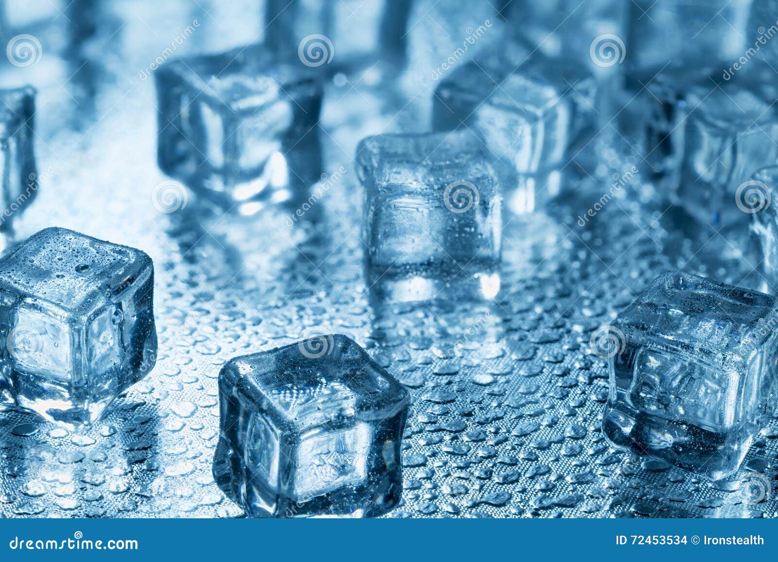 Melting Transparent Blue Ice Cubes on Glass Stock Photo - Image of ...
