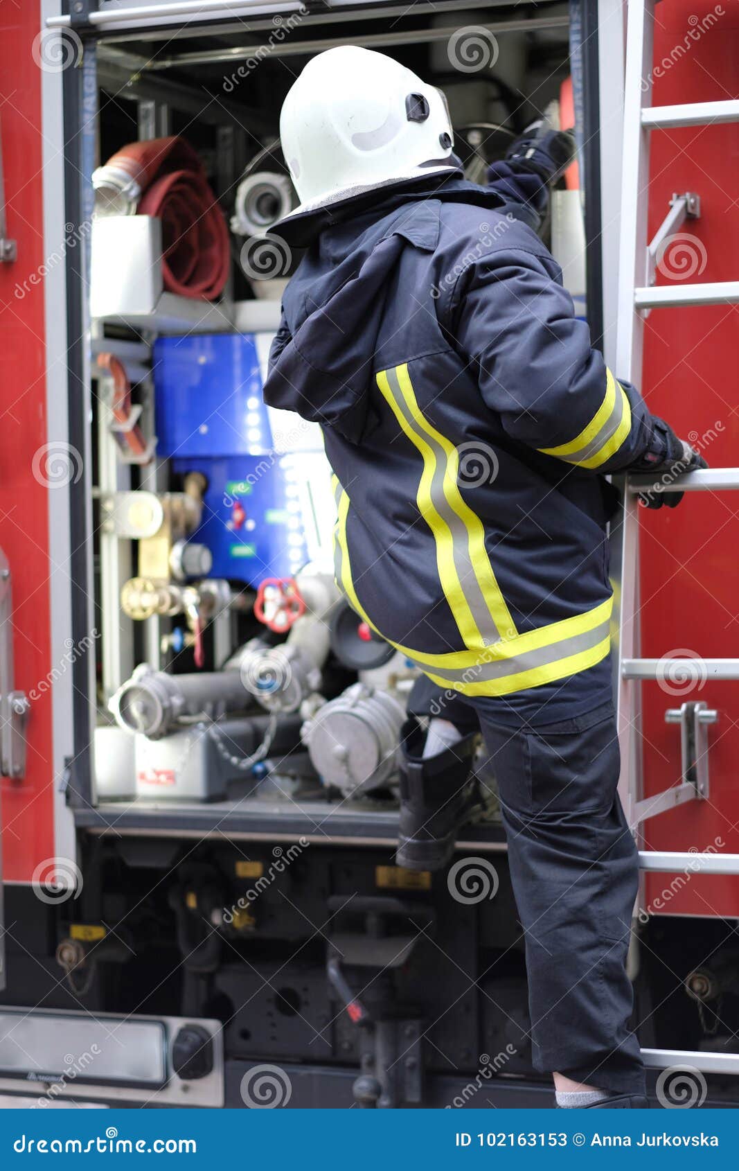 Fireman at the Fire Engine Control Panel Editorial Stock Photo - Image ...
