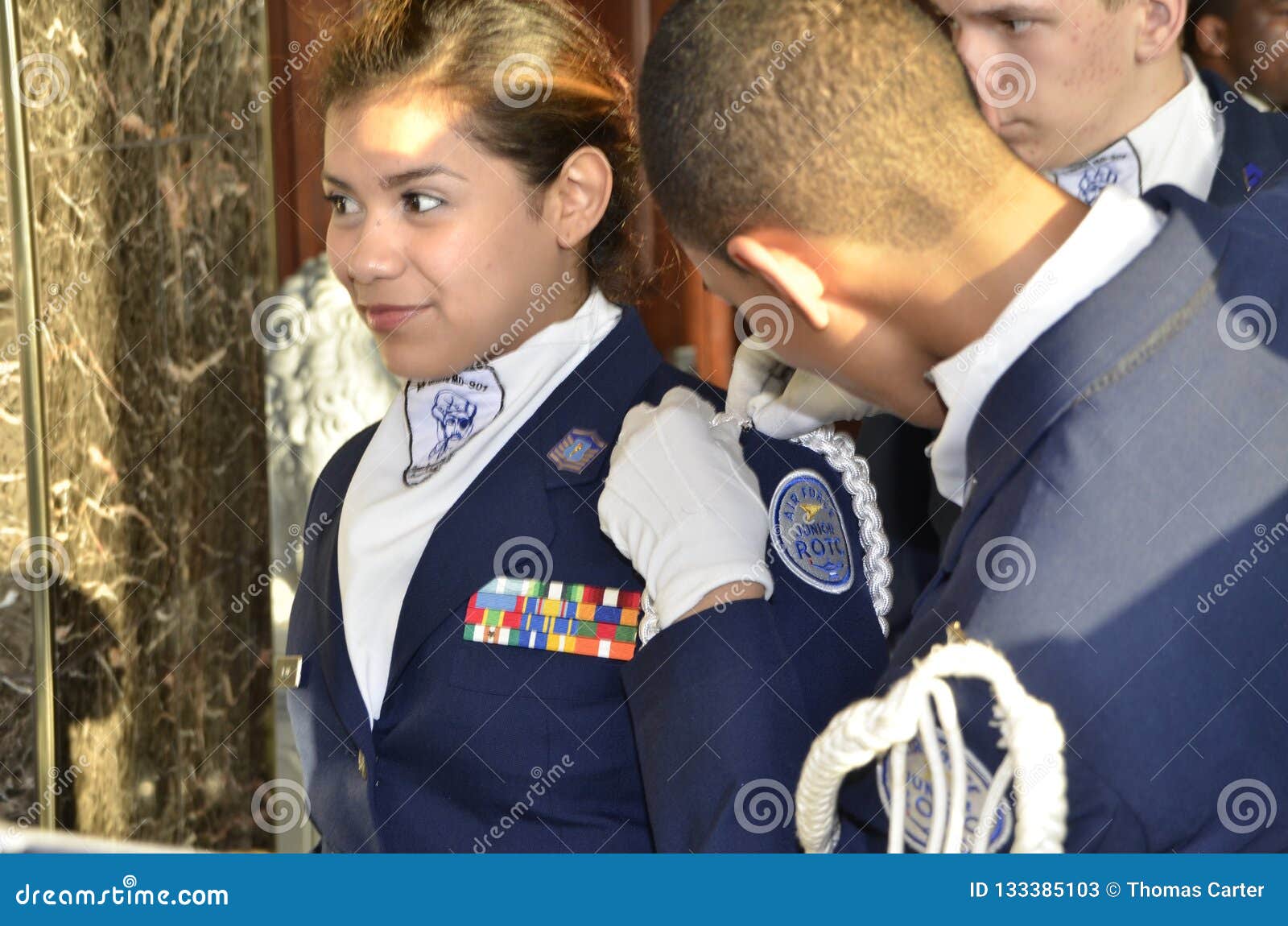 A Member of the Junior ROTC Gets Help with Her Uniform Editorial Stock ...