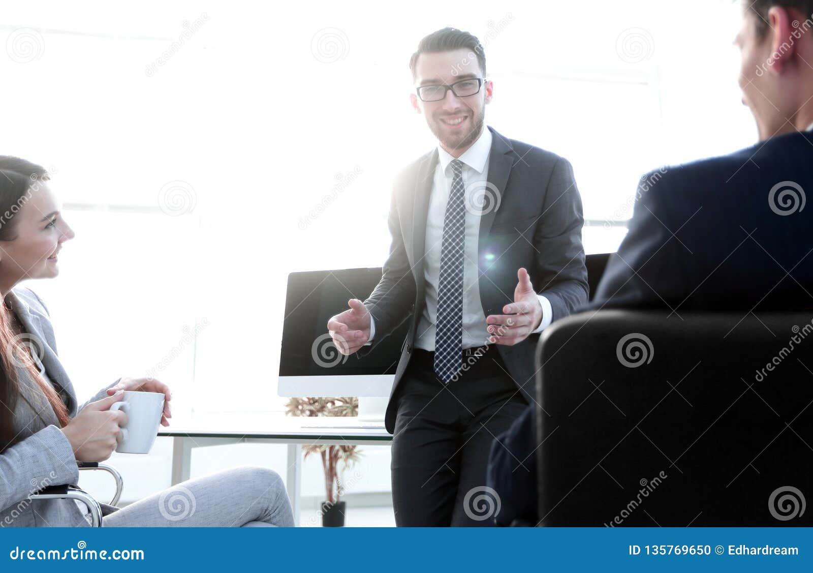 Members of the Business Team Talking in the Office Stock Photo - Image ...