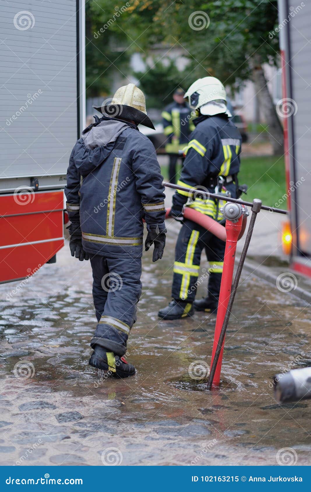Members of the Fire Brigade Editorial Image - Image of helmet, blurred ...