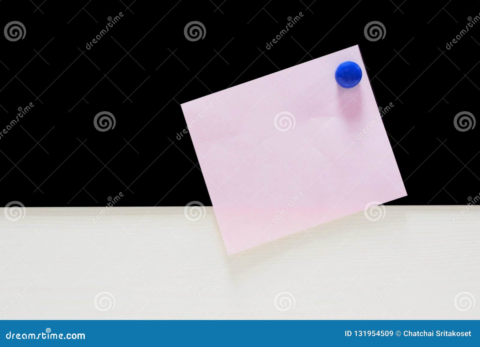 Memo Pink Paper with Blue Magnet on Black and White Background Stock ...