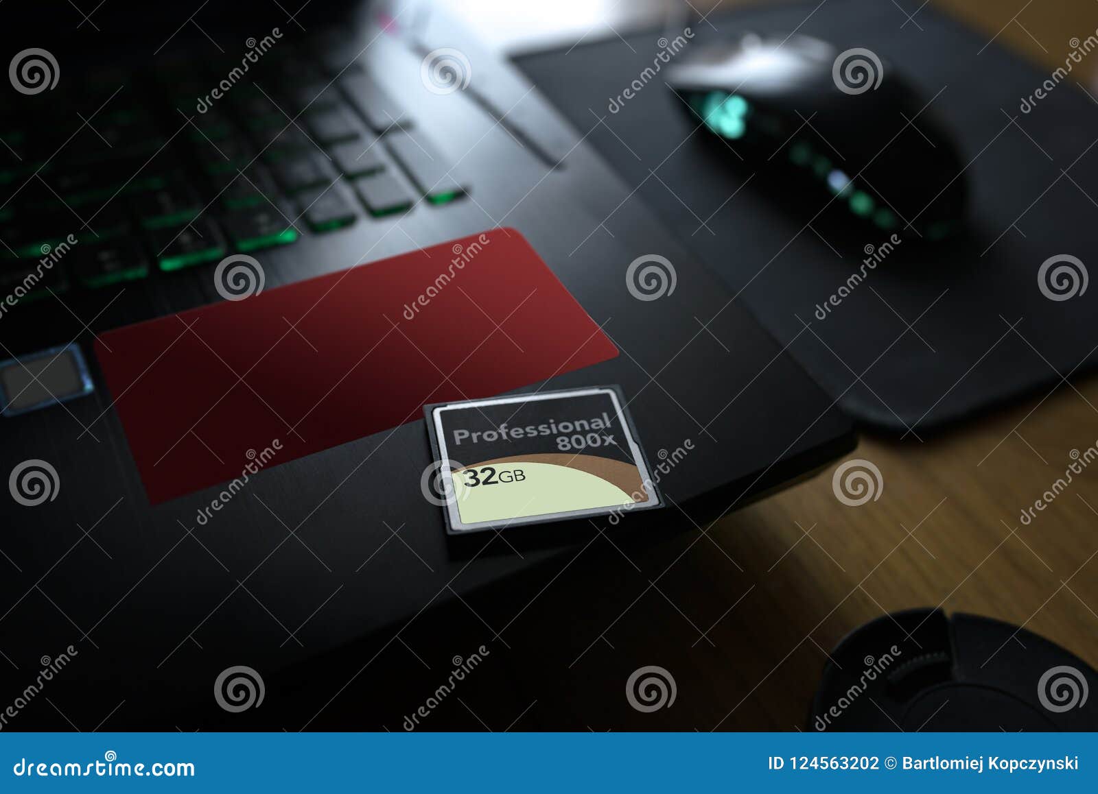 Memory Card 32 GB Lying on the Black Modern Notebook Editorial ...