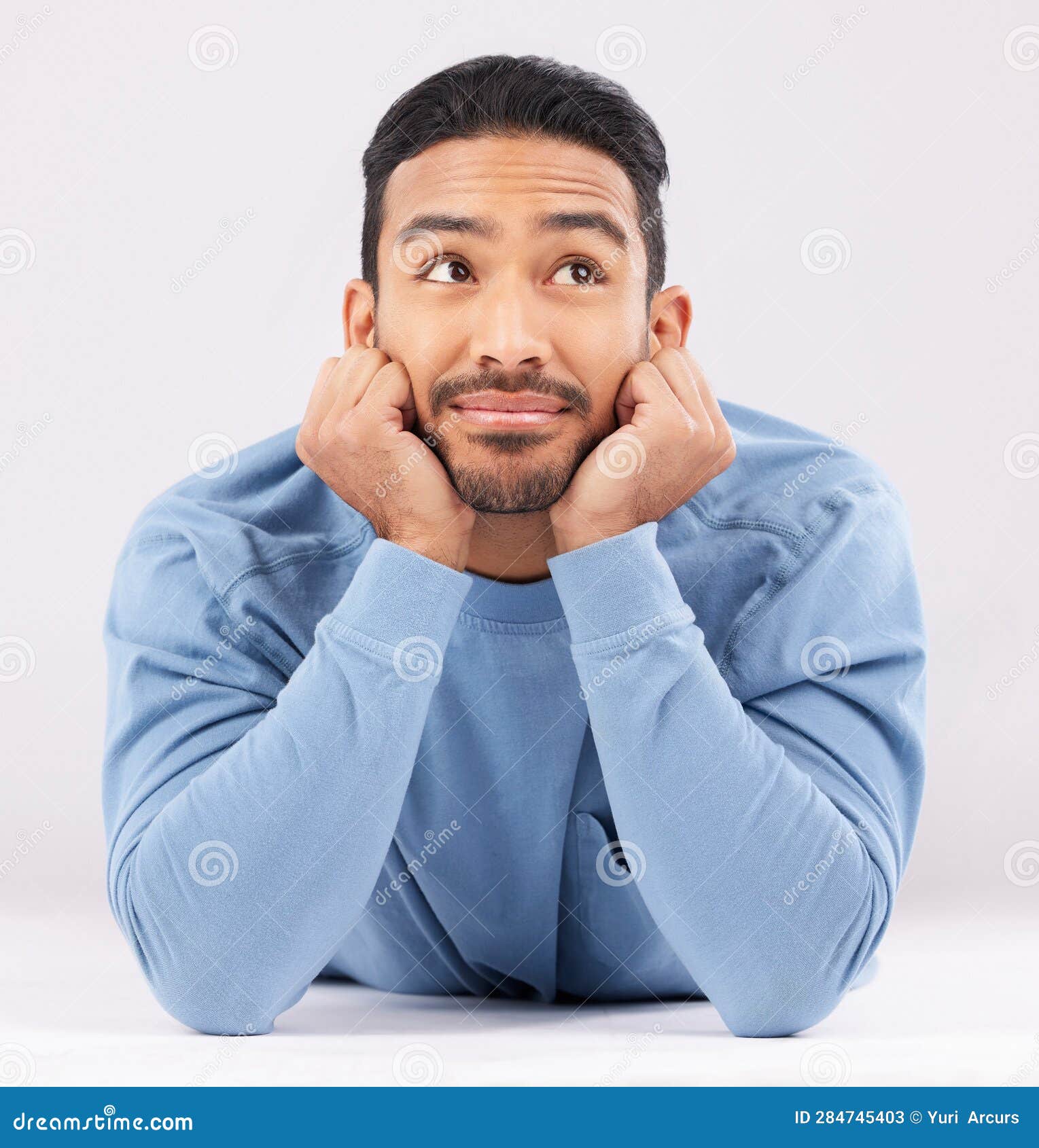 Memory, Thinking and Young Man in a Studio Resting on His Arms with a ... Memory, Thinking and Young Man in a Studio Resting on His Arms with a ...