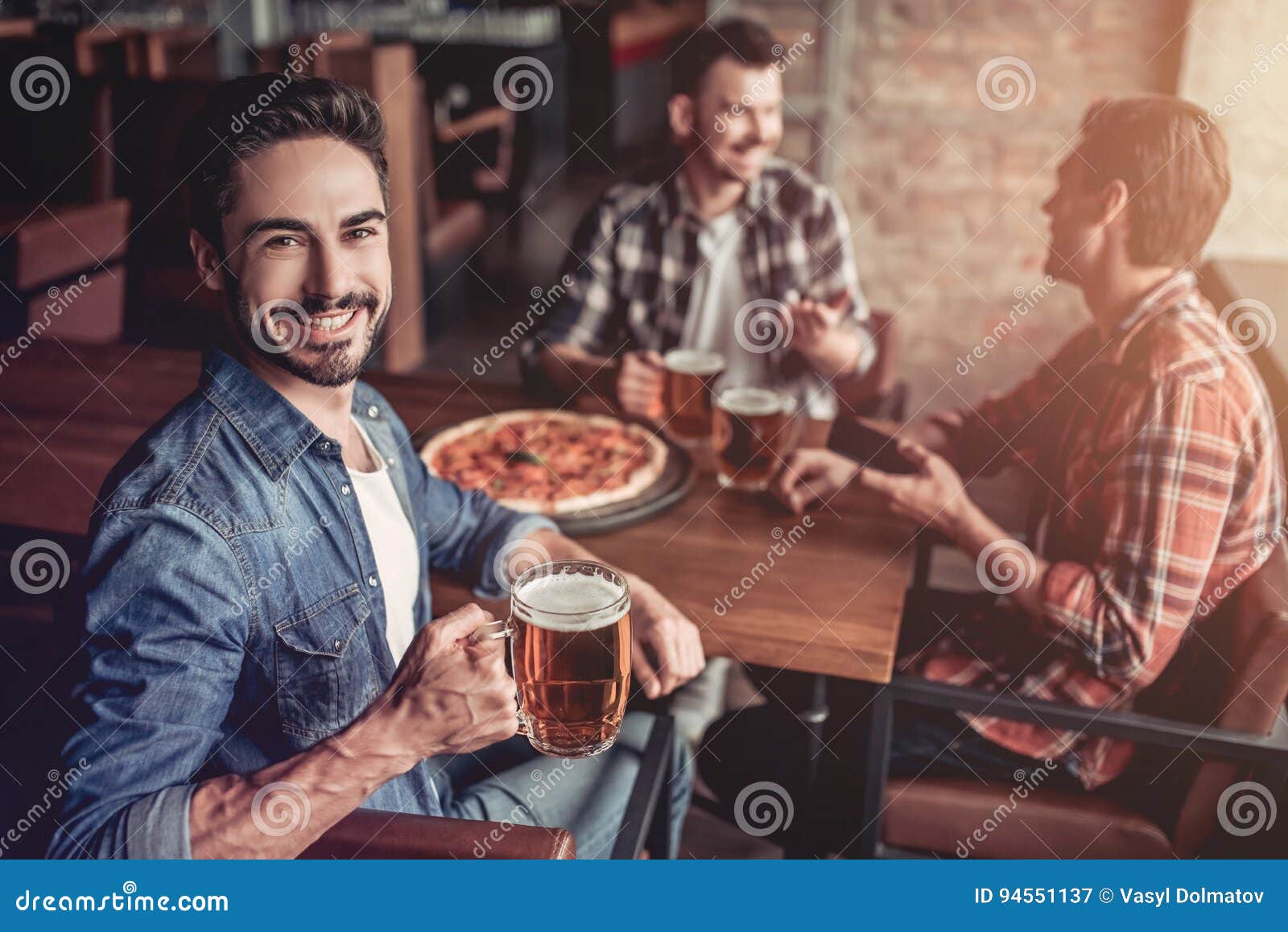 Men in bar stock image. Image of closeup, meeting, cheers - 94551137