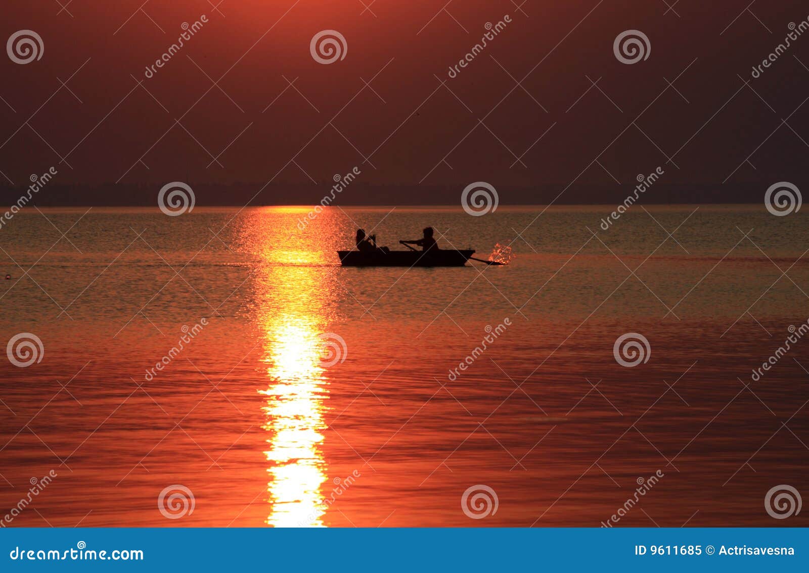 Men in a Boat at the Sunset Stock Image - Image of fishing, paddle: 9611685