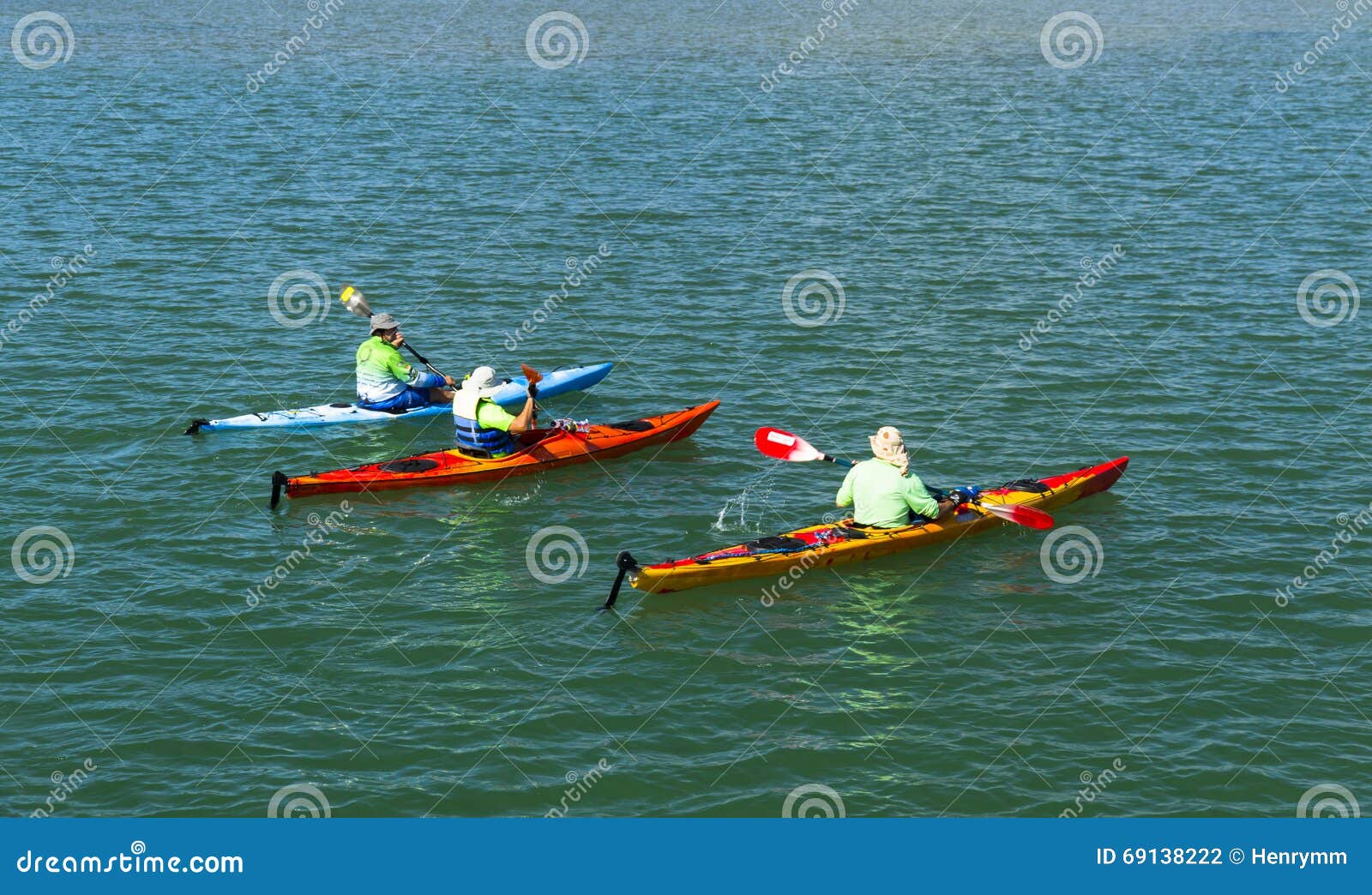 Men canoeing in the lake. stock photo. Image of three - 69138222