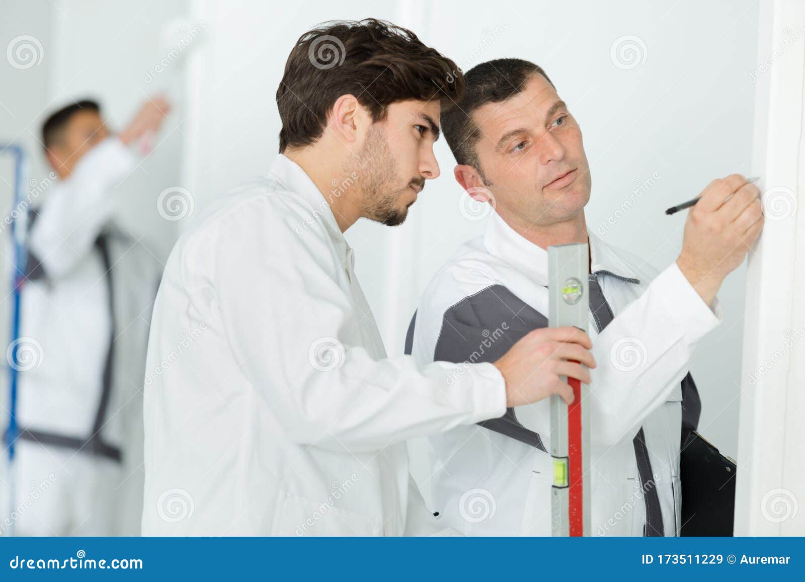 Men Checking Wall with Professional Aluminum Level Stock Image - Image ...