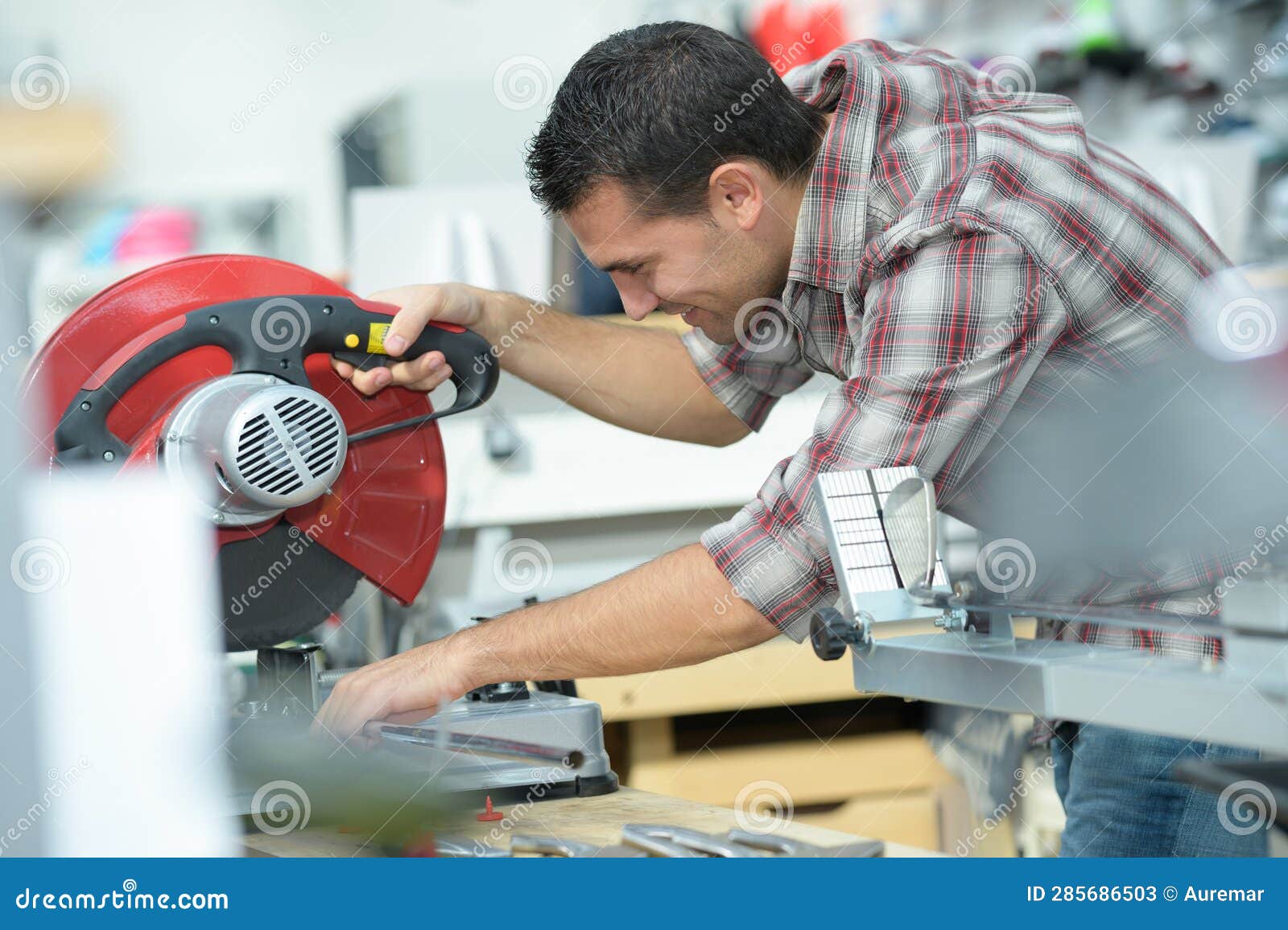 Men cuts iron circular stock image. Image of equipment - 285686503