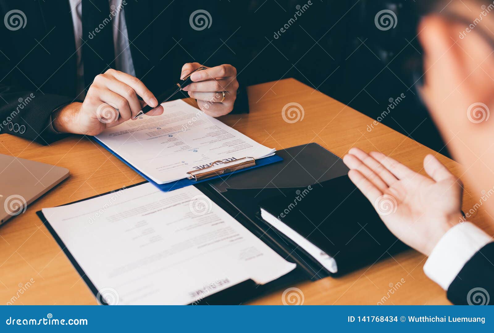 Men are Describing the Employment History of the Employer about His ...