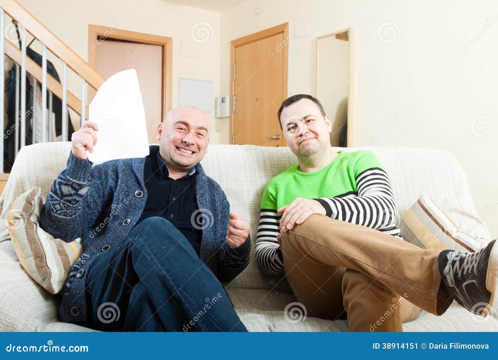 Men Discussing Something at Home Stock Image - Image of document ...
