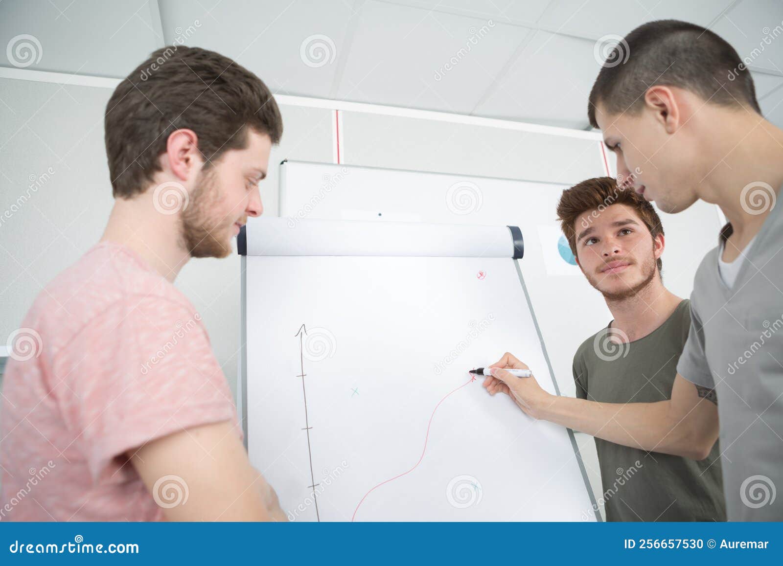 Men drawing a graph stock photo. Image of analyze, young - 256657530