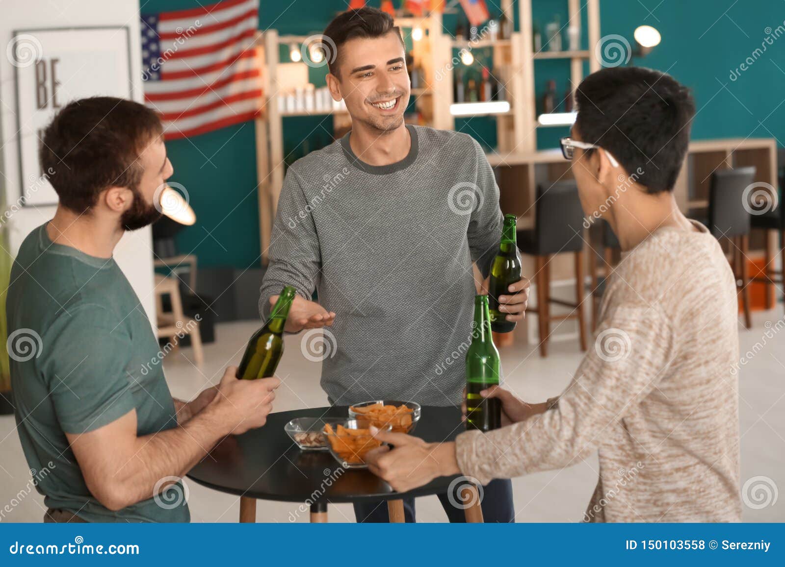 Men drinking beer in bar stock photo. Image of craft - 150103558