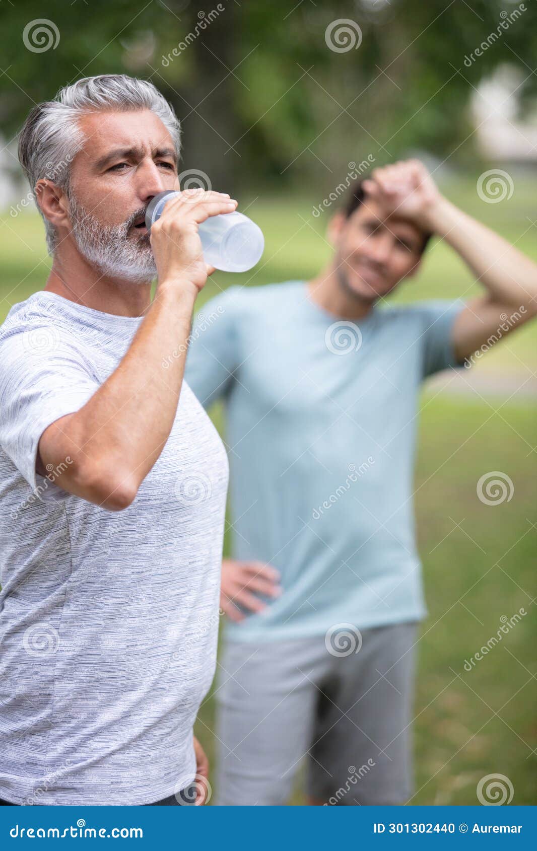 Men Drinking Water from Bottle Outside Stock Photo - Image of portrait ...