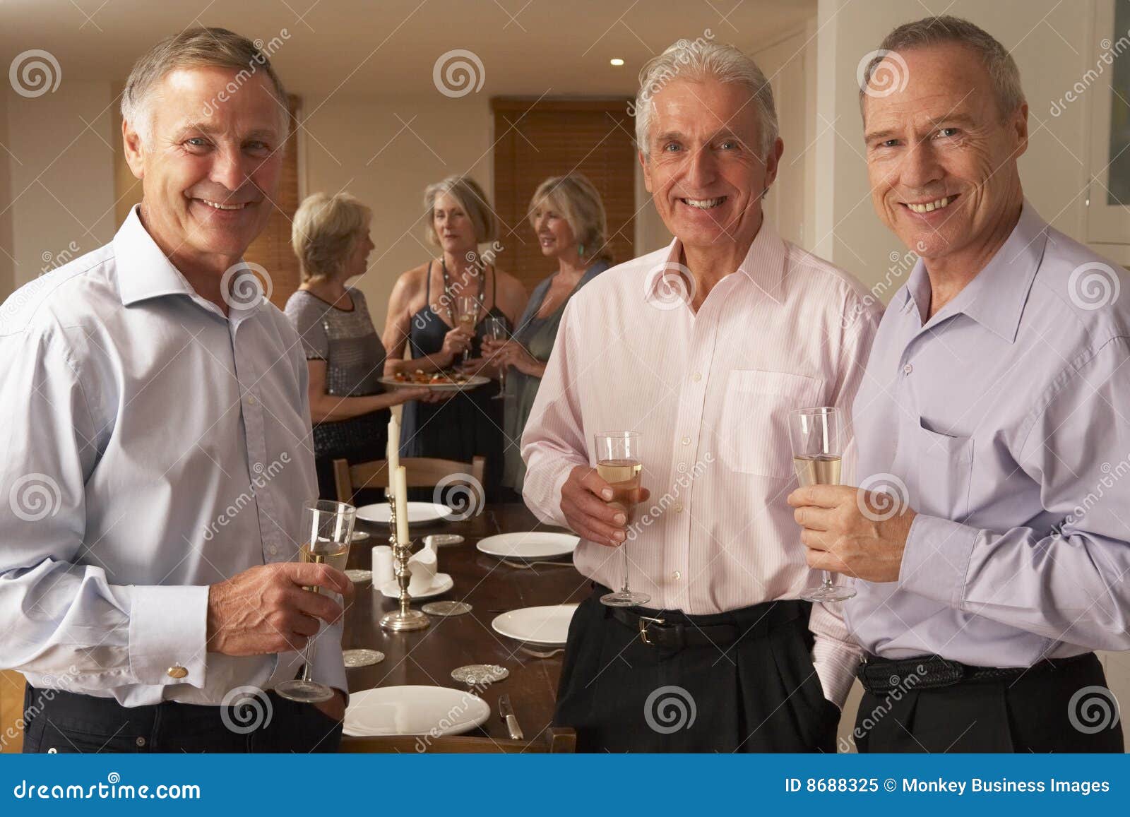 Men Enjoying Champagne at a Dinner Party Stock Image - Image of ...