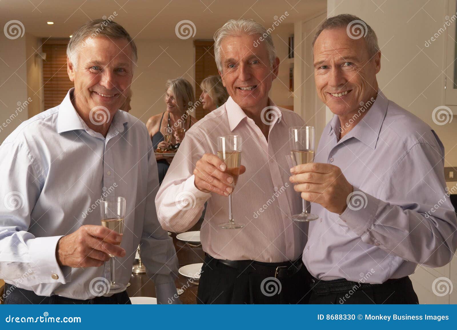Men Enjoying Champagne at a Dinner Party Stock Photo - Image of camera ...