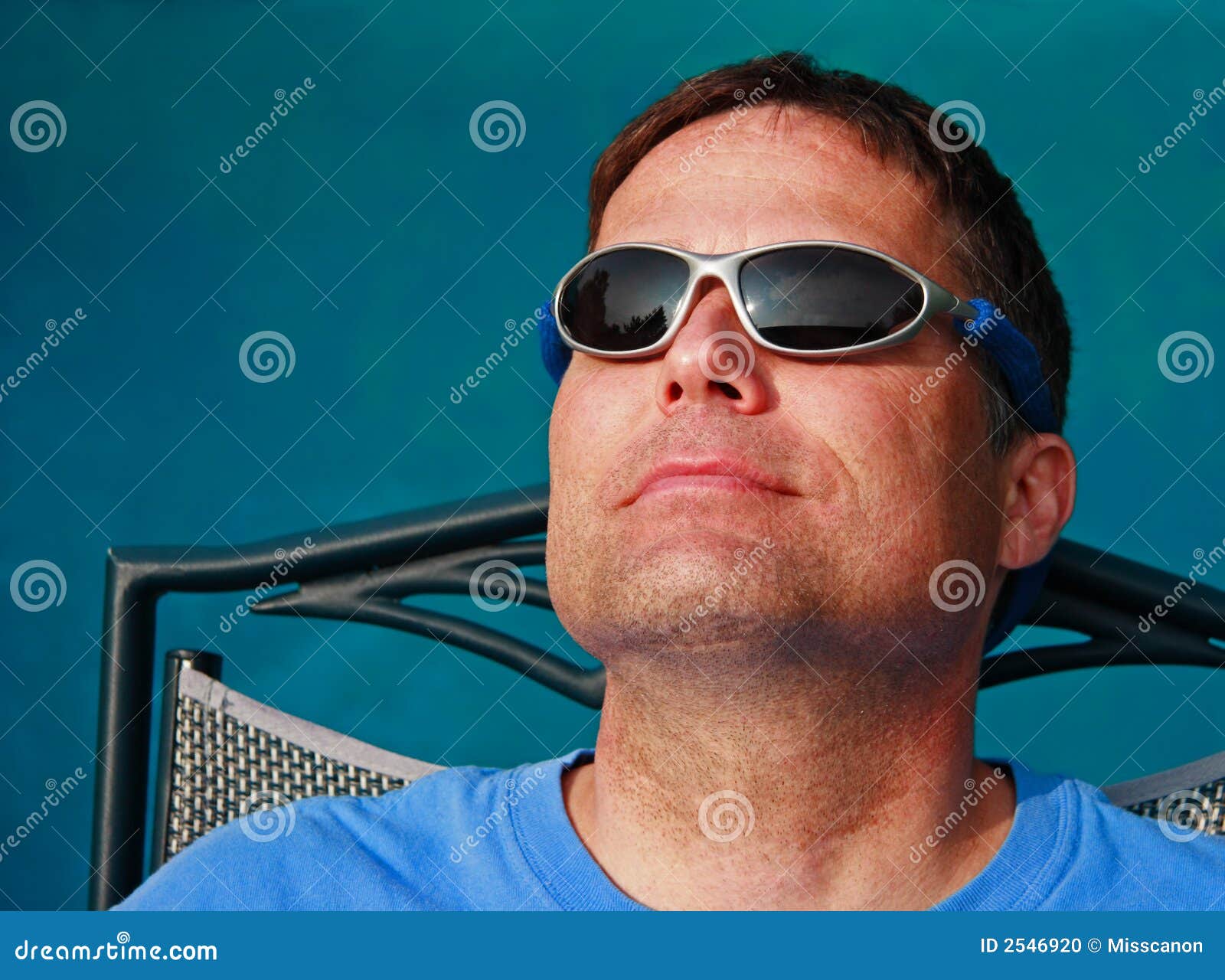 Men enjoying sun stock photo. Image of masculine, blue - 2546920