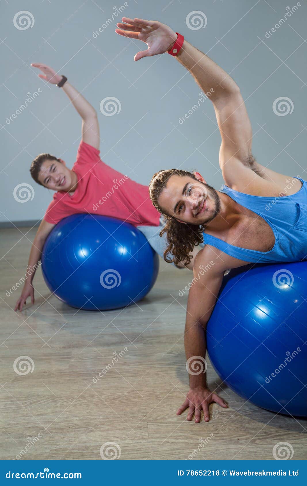 Men Exercising with Exercise Ball Stock Photo - Image of determination ...