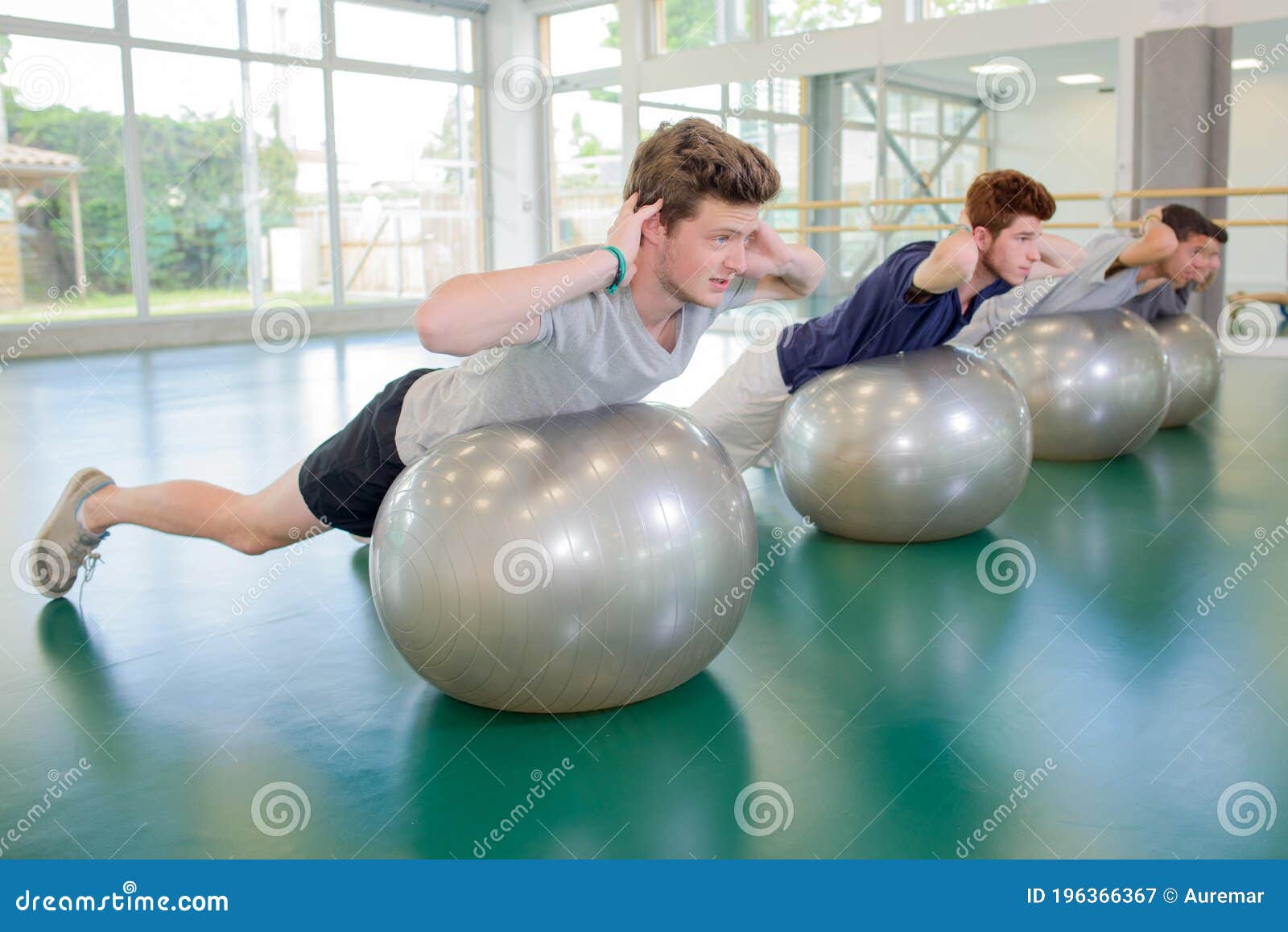 Men Exercising with Gym Ball Stock Image - Image of routine, strength ...