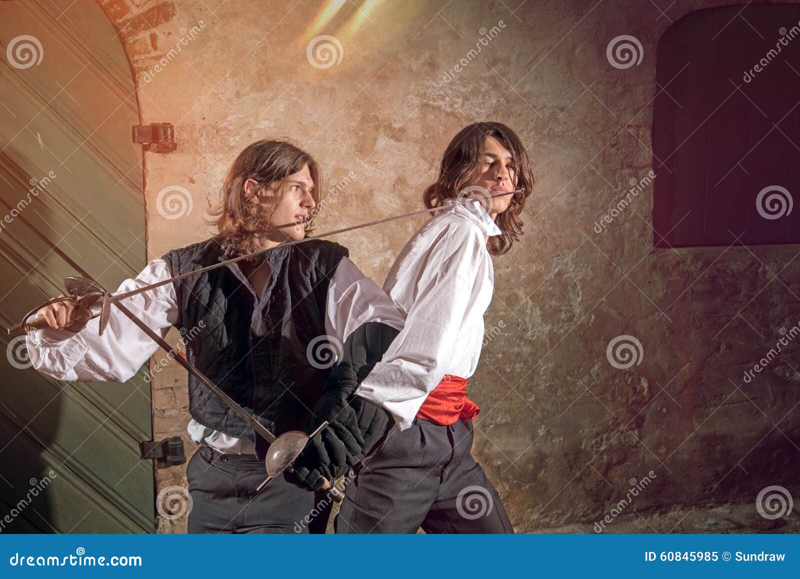 Men fighting with swords stock image. Image of special - 60845985
