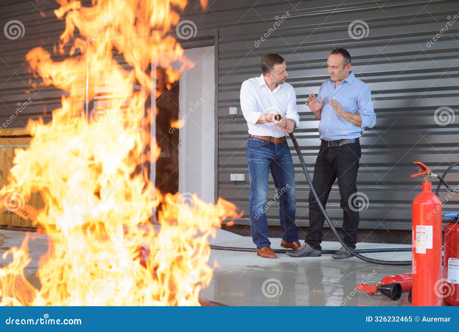 Men And Fire-extinguisher On Flame Background Royalty-Free Stock Photo ...