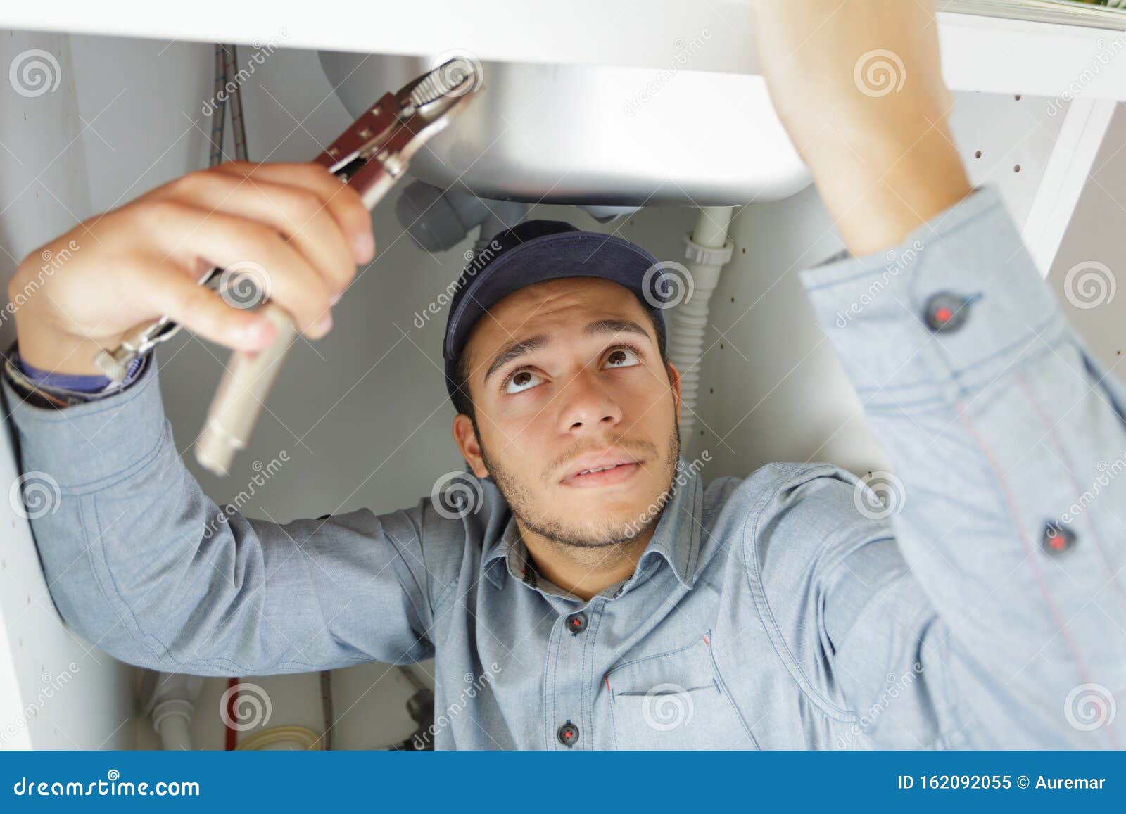 Men Fixing Sink in Bathroom Stock Image - Image of holding, industrial ...