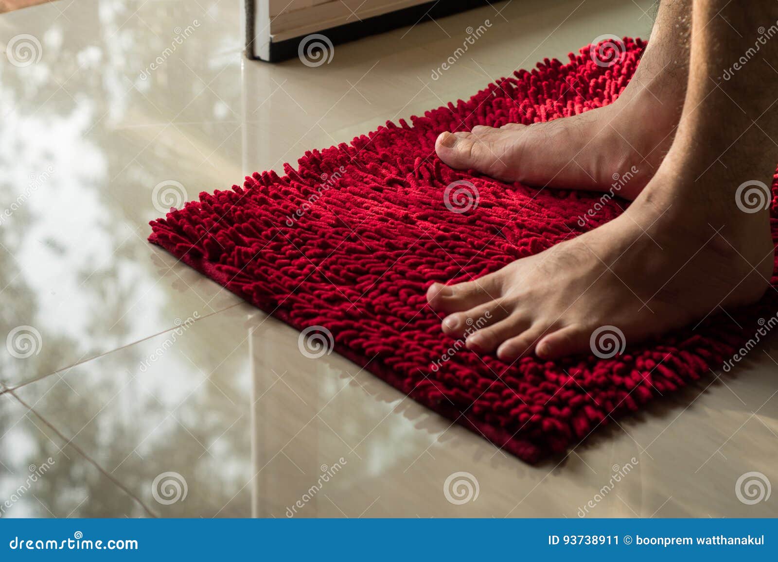 Men foot on red doormat. stock image. Image of lifestyle - 93738911