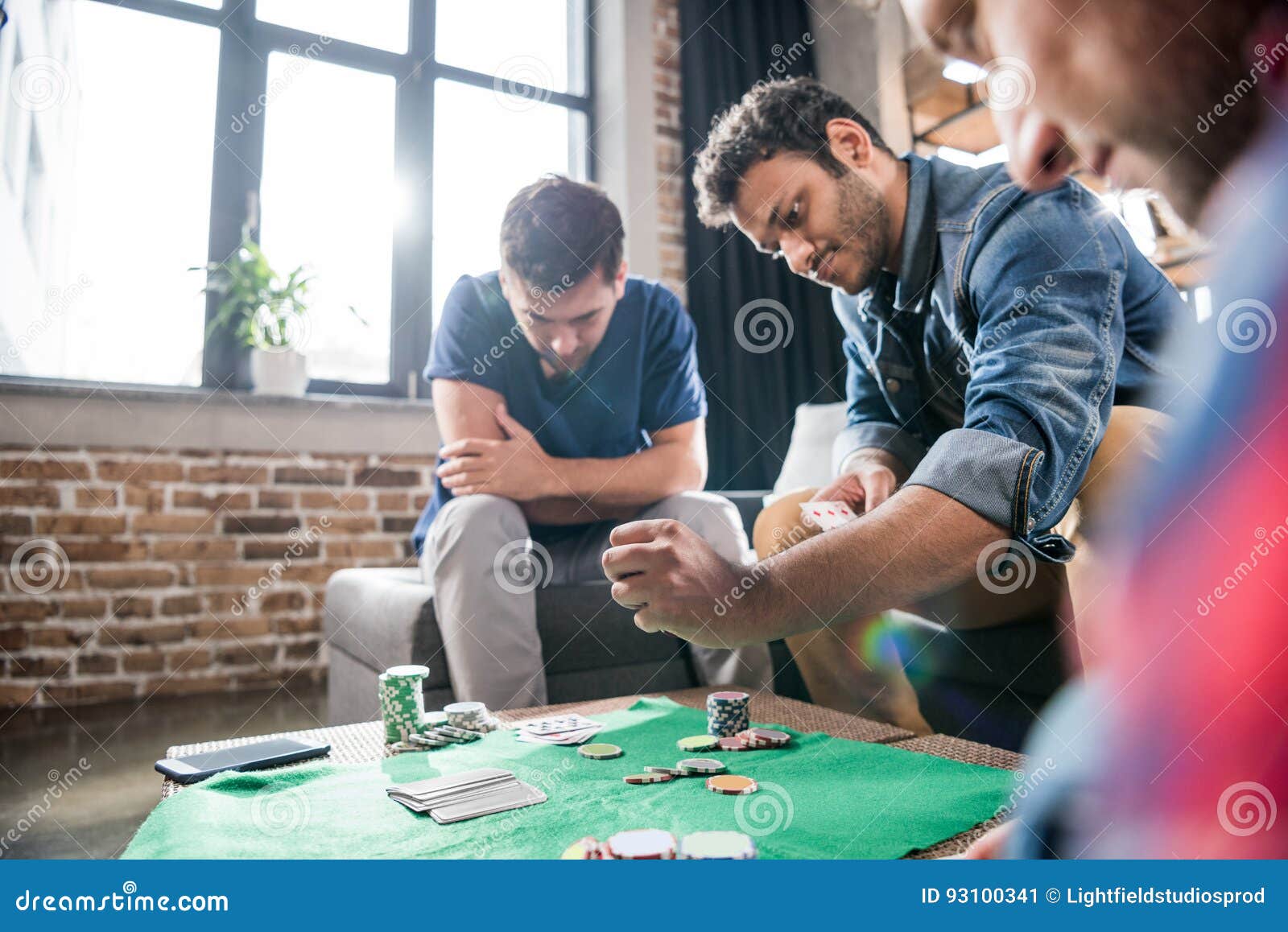 Men at gaming table stock image. Image of green, game - 93100341