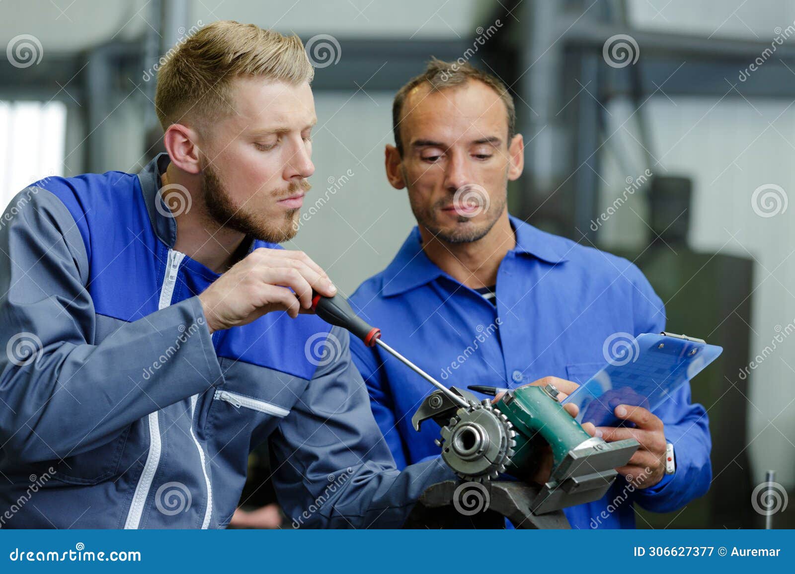 Men and Gear Mechanism in Factory Stock Image - Image of mechanic ...