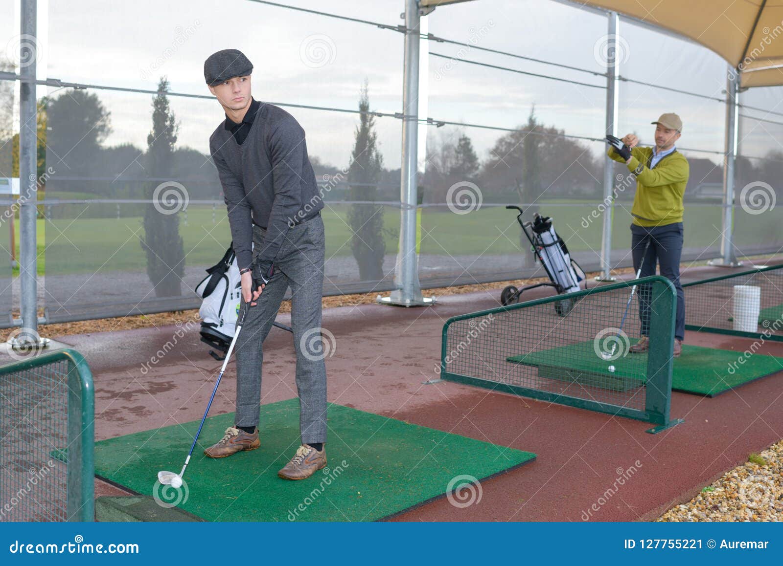 Men at golf course stock image. Image of green, adult - 127755221