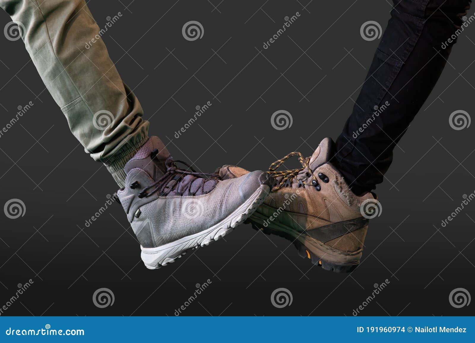 Men Greeting Each Other with Foot instead of Handshake Stock Photo ...