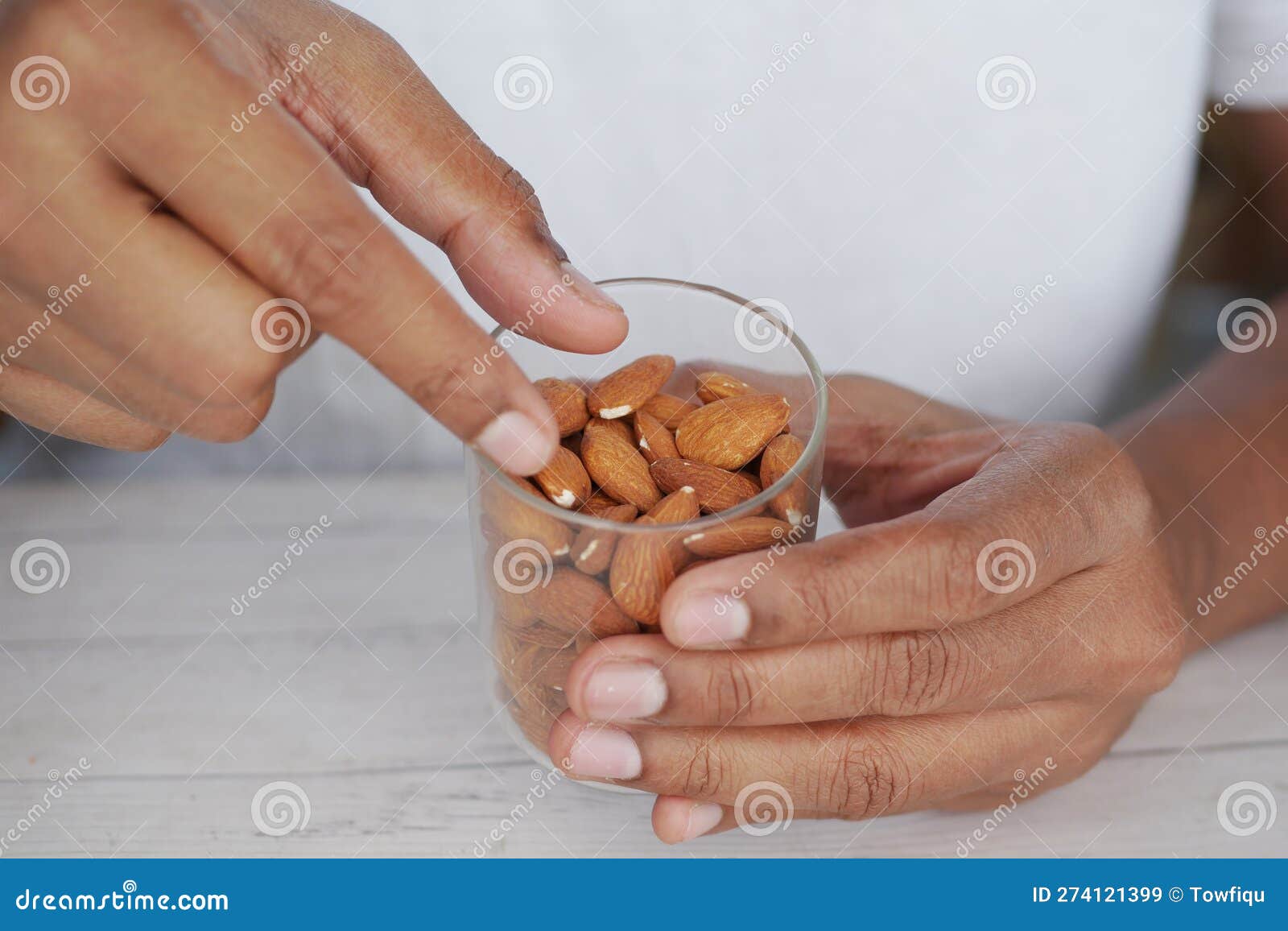 Men hand pick almond nut stock image. Image of natural - 274121399