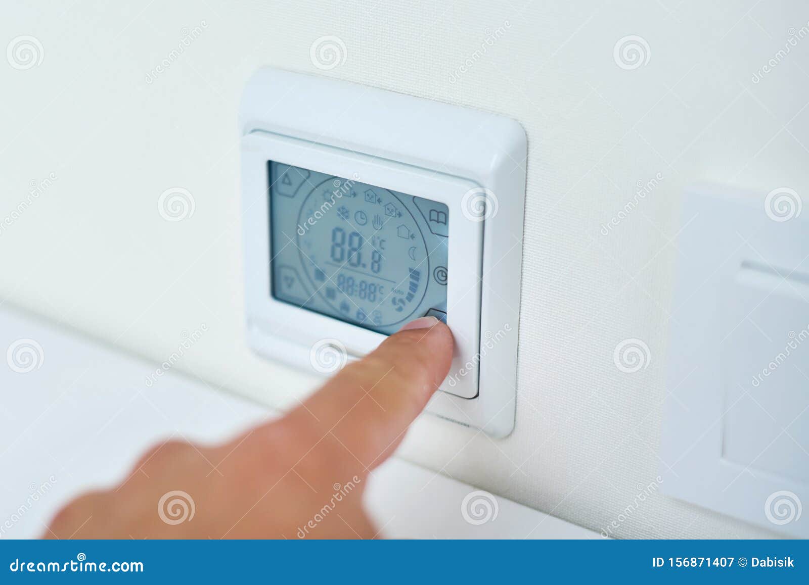 Men Hand Setting Temperature on the Underfloor Heating Control Panel ...