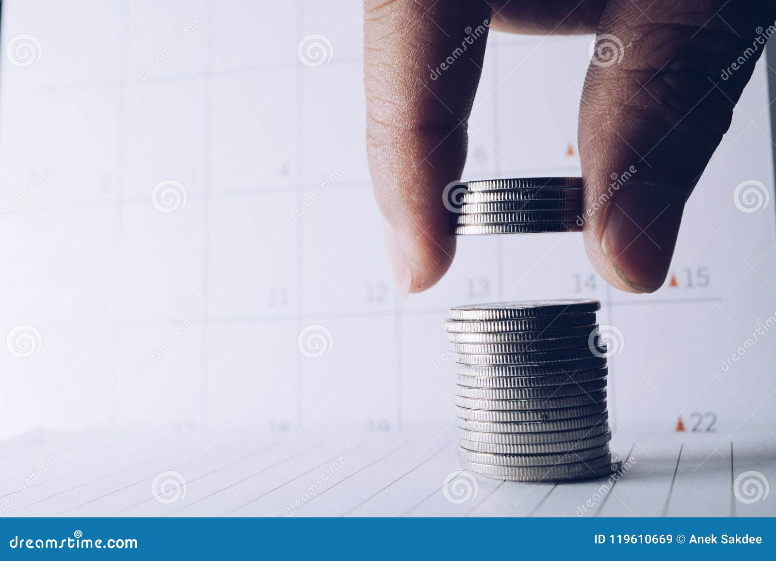 Stack of coins on book stock image. Image of finance - 119610669