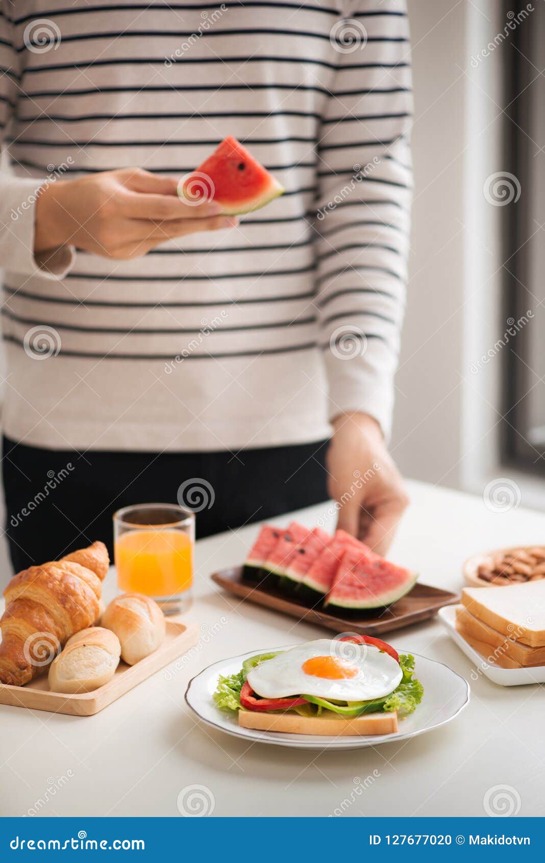 Men Having Breakfast with Toasts at Table Stock Photo - Image of snack ...