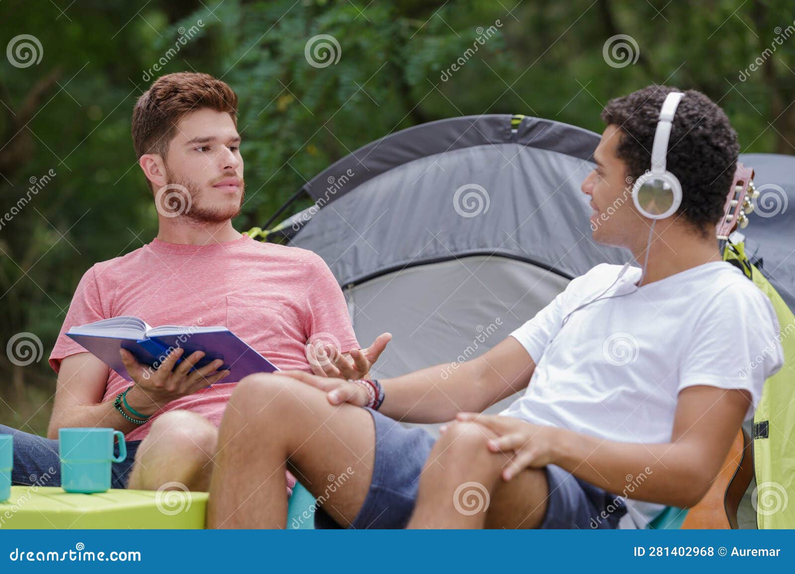Men Having Conversation Outside Tent Stock Photo - Image of nature ...