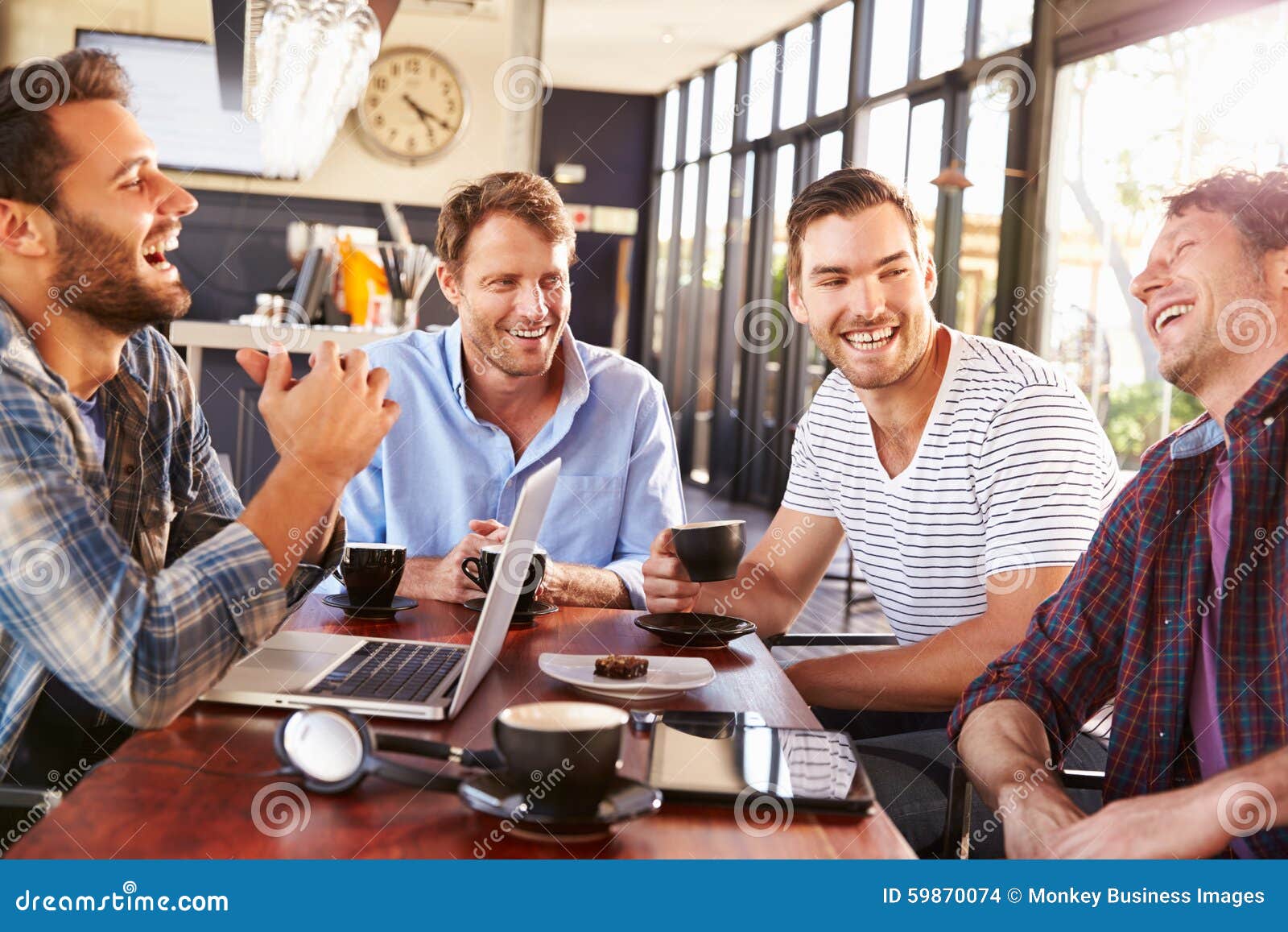 Men Having Fun at a Coffee Shop Stock Photo - Image of bonding ...