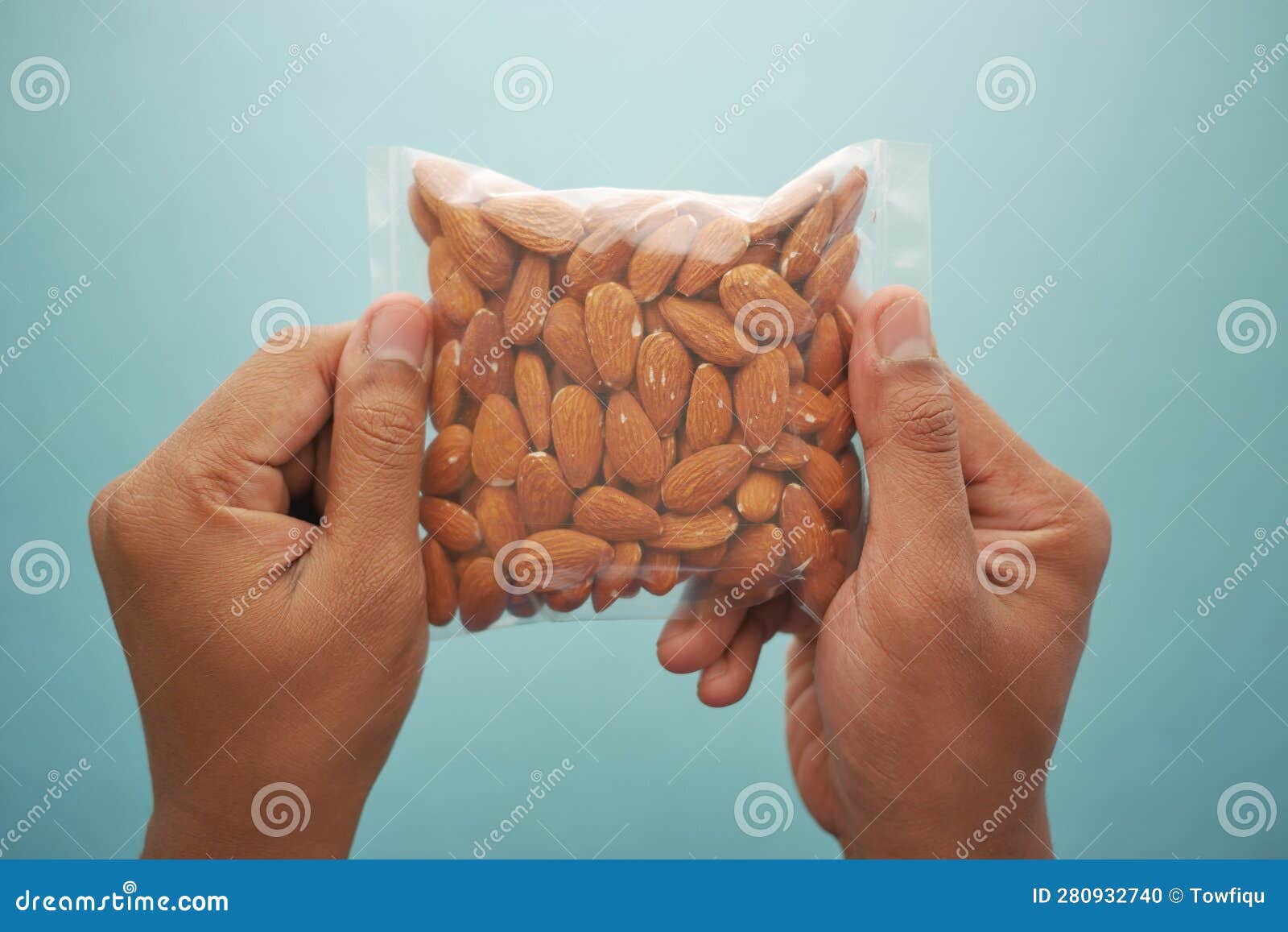 Men Holding a Almond Nut Packet Stock Photo - Image of hand, calcium ...
