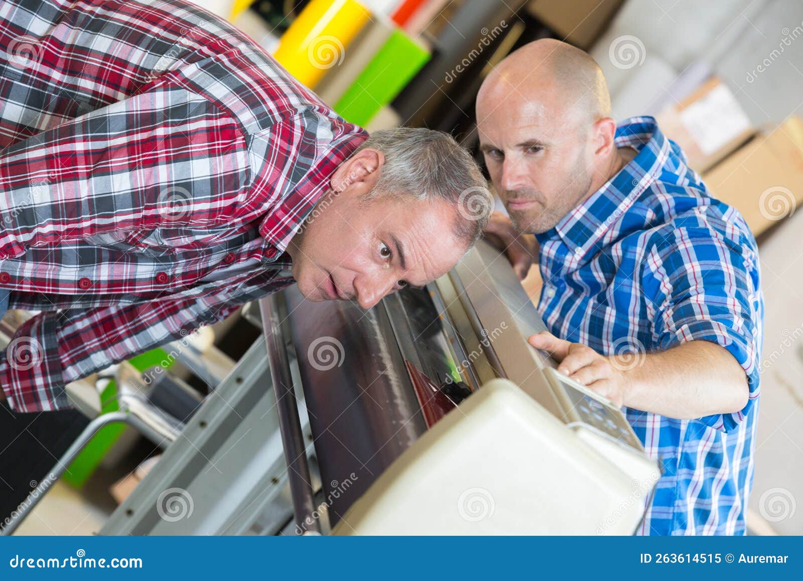 Men Inspecting Billboard Machine Stock Image - Image of workshop, model ...
