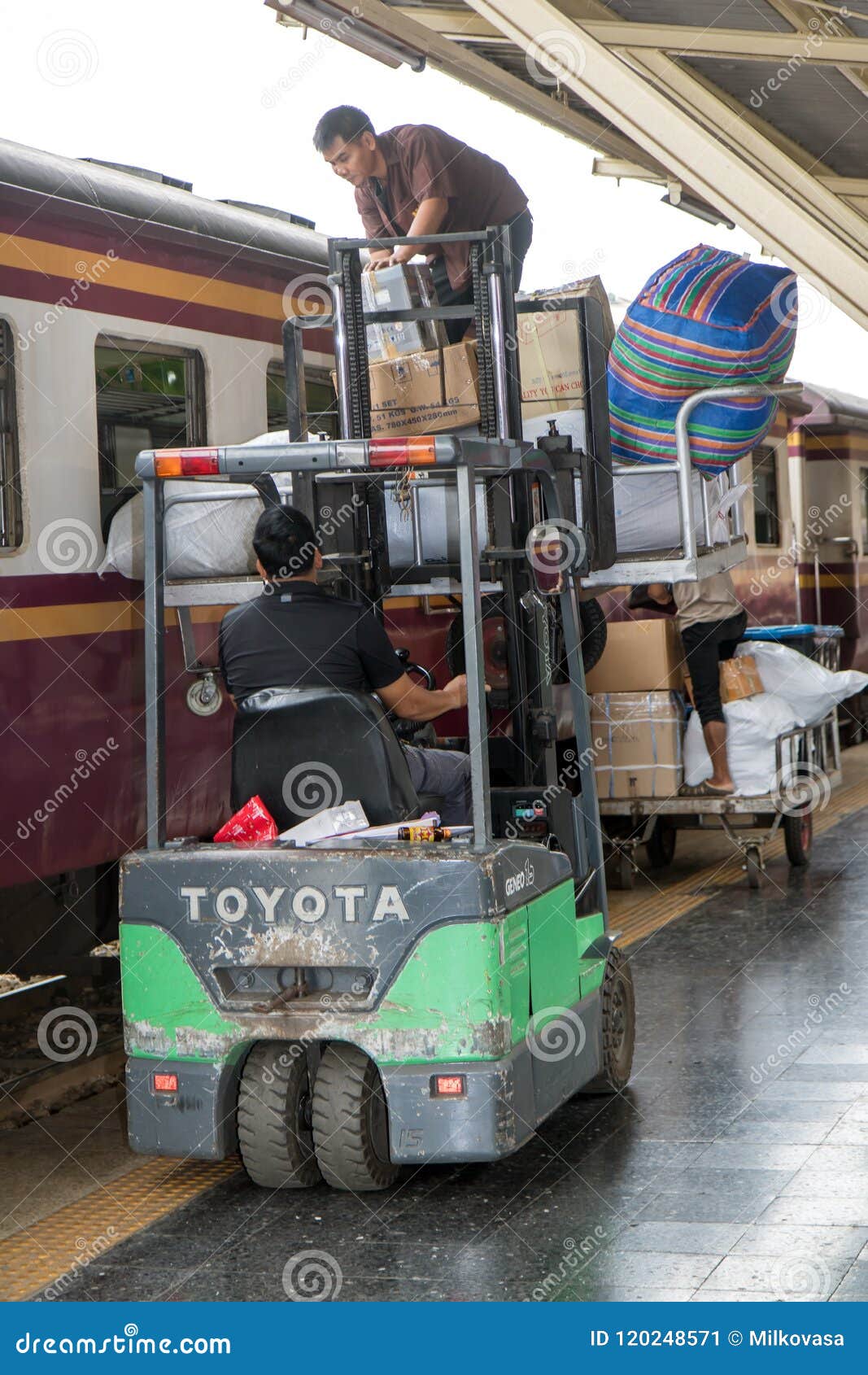 Men Loaded Packages into the Train through the Window Editorial Photo ...