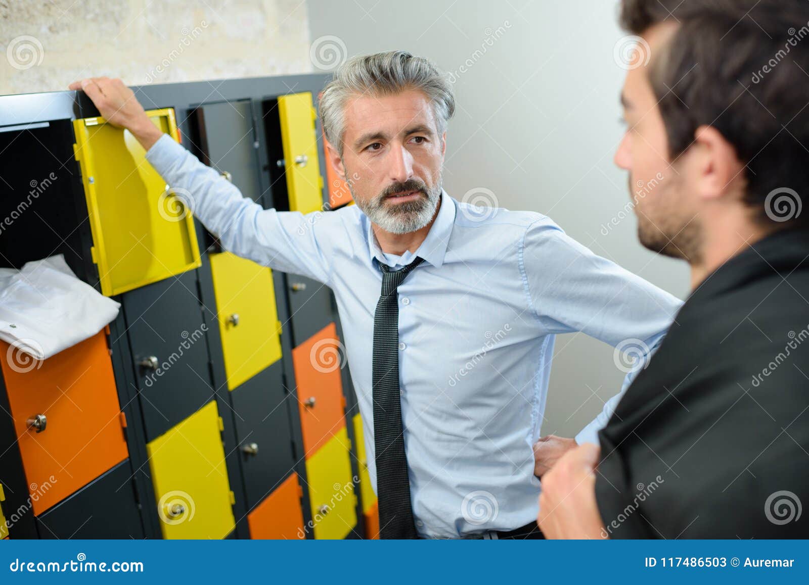 Men in locker room stock image. Image of multicolours - 117486503