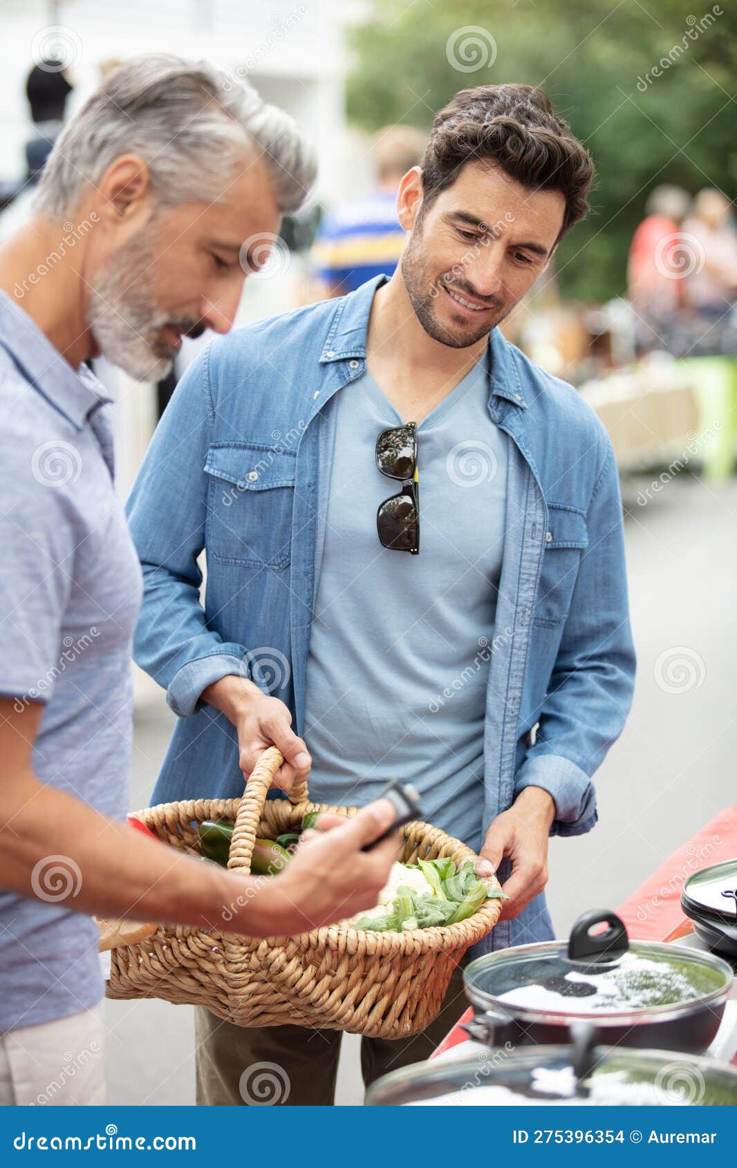 Men Looking at Cookware on Street Market Stock Photo - Image of stall ...